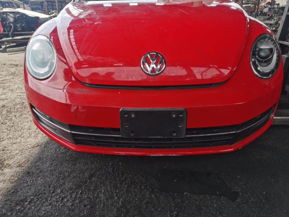 VW NEW BEETLE 1.2 TURBO HALF CUT - Sunny Courtyard